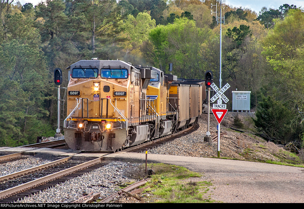 UP 6897 Leads KCS CWEKC25
